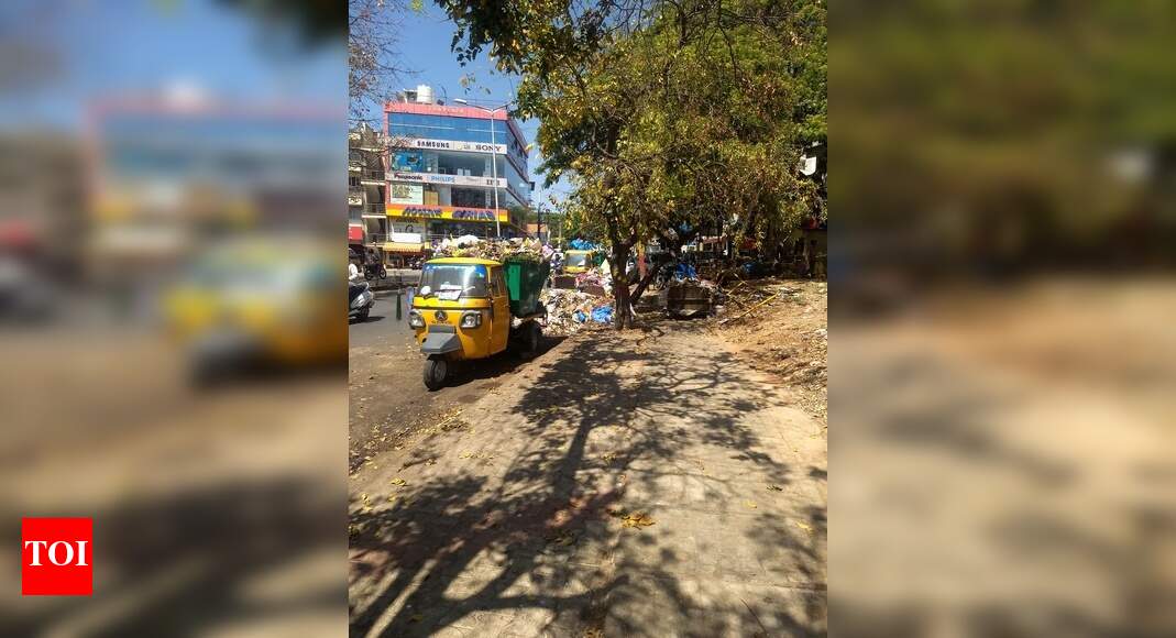 BBMP vehicle parked in the main road - Times of India