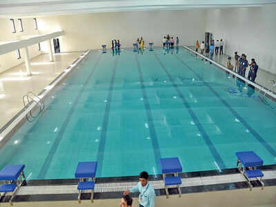 VNSGU gets new synthetic track, swimming pool | Surat News - Times of India
