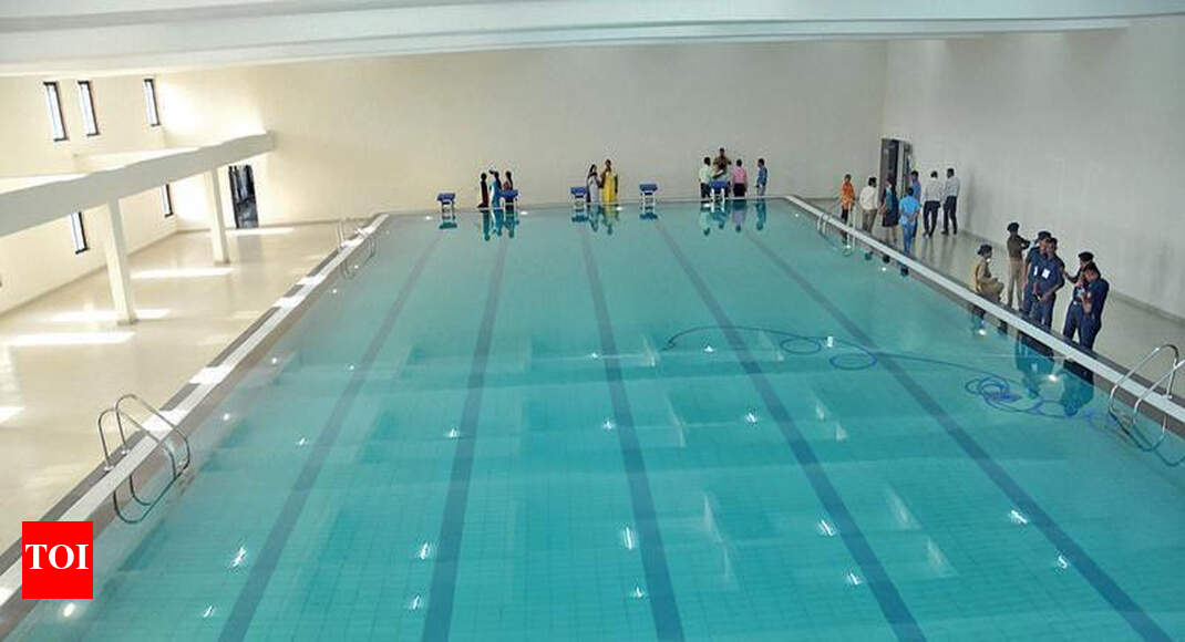 VNSGU gets new synthetic track, swimming pool | Surat News - Times of India