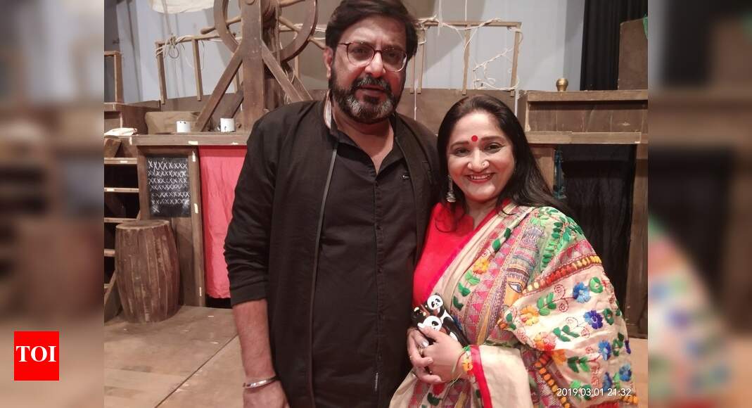 Mehul and Alpana Buch take time out for a play while shooting for a ...