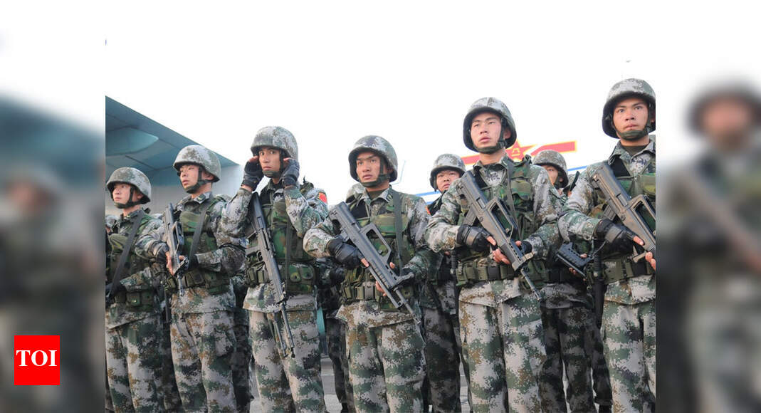 China defends heavy defence spending, hints at further rise - Times of ...