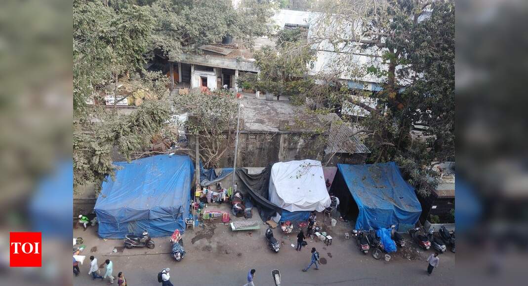 Slum Re-buildation - Times of India
