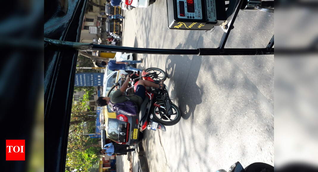 Riding without Helmet on Police written Bike - Times of India