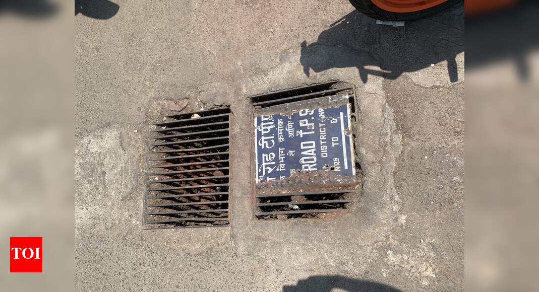 A shit sign board - Times of India