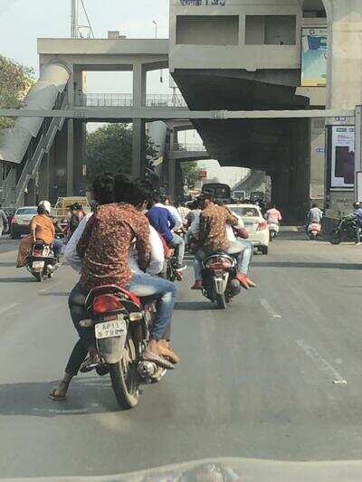 Triple and Dangerous Driving without Helmets - Times of India