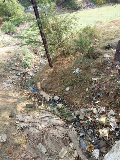 Pond filling with debrish - Times of India