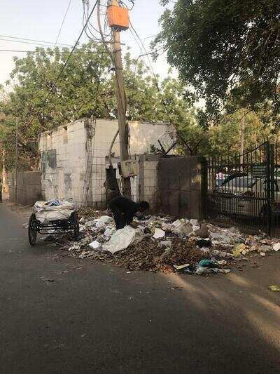 Garbage on the road - Times of India