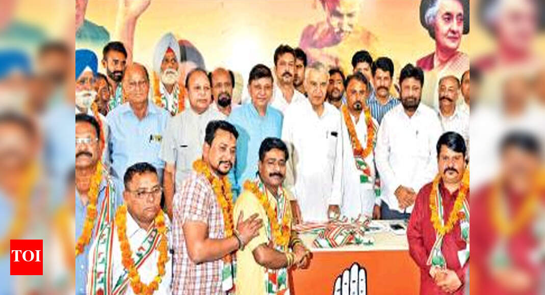 Senior leaders from BJP, BSP join hands with Congress - Times of India