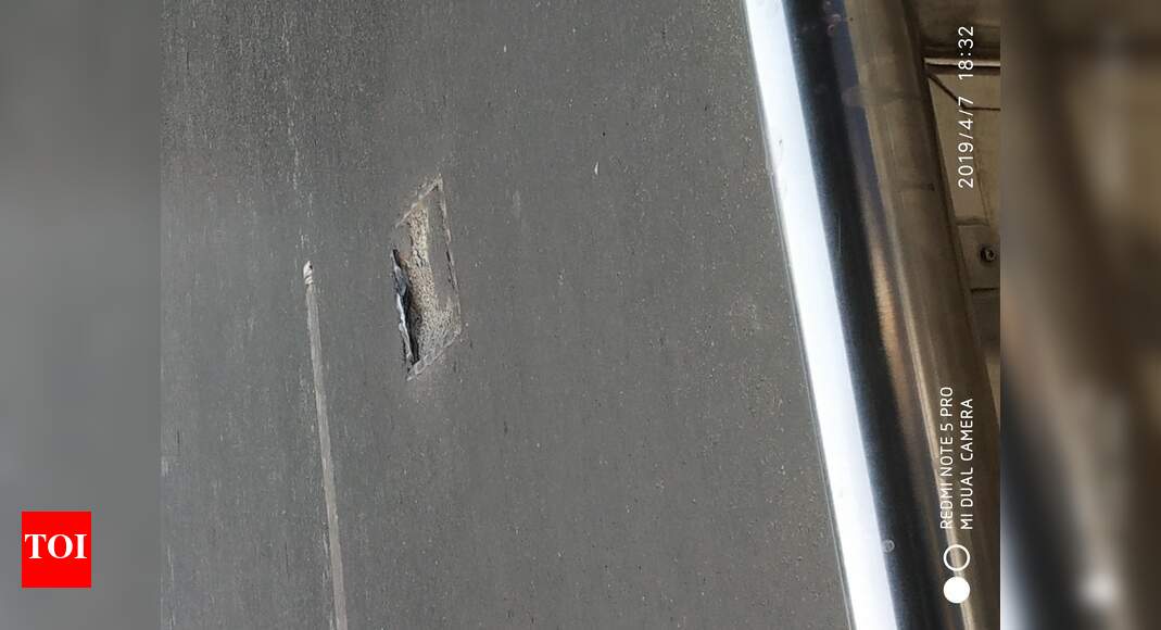 Shallow depression on the road. - Times of India