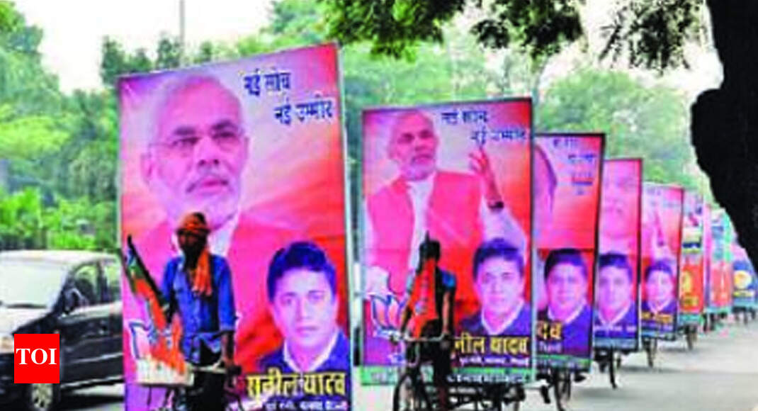 MCMC issues notice to remove 50 posters of PM Modi | Agra News - Times ...