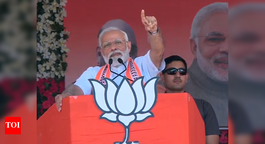 Narendra Modi: PM Modi accuses Congress of election scam, looting money ...