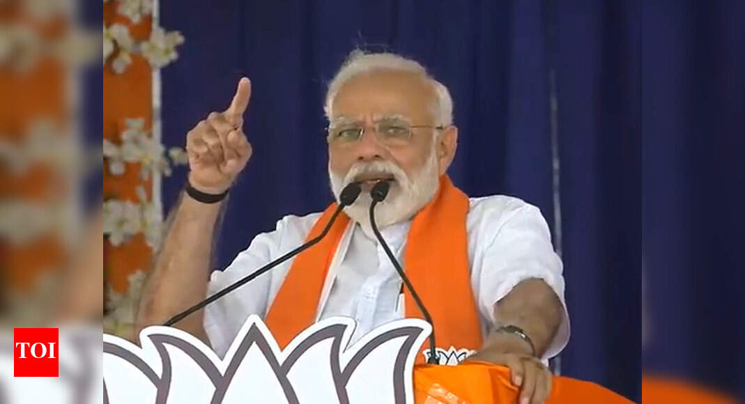 PM Modi slams Congress for 'poll scam', sedition law repeal promise ...