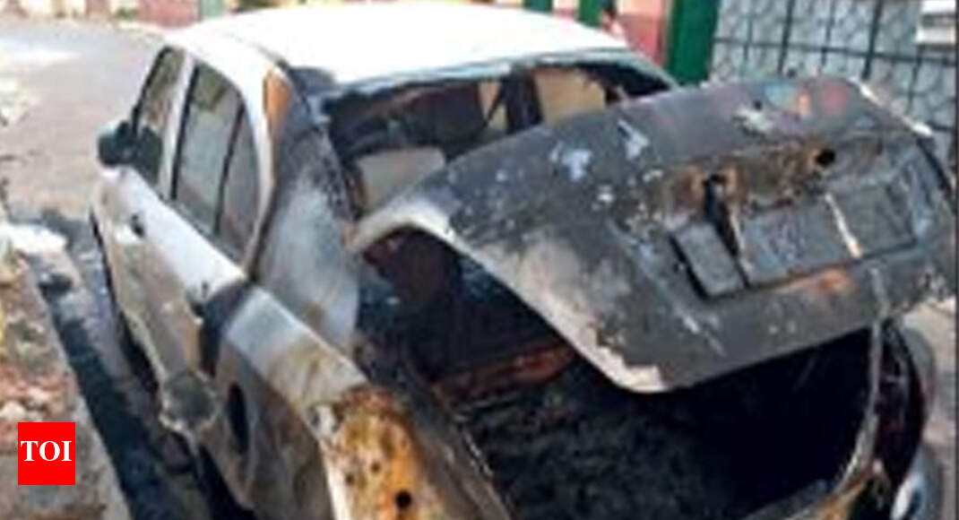 Burnt car in garage, owner gets challan for stop-line violation ...