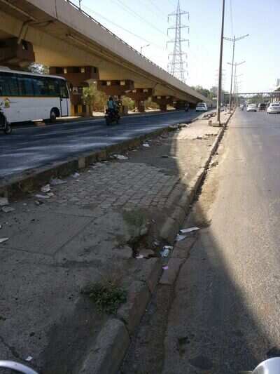 no proper footpath for people - Times of India