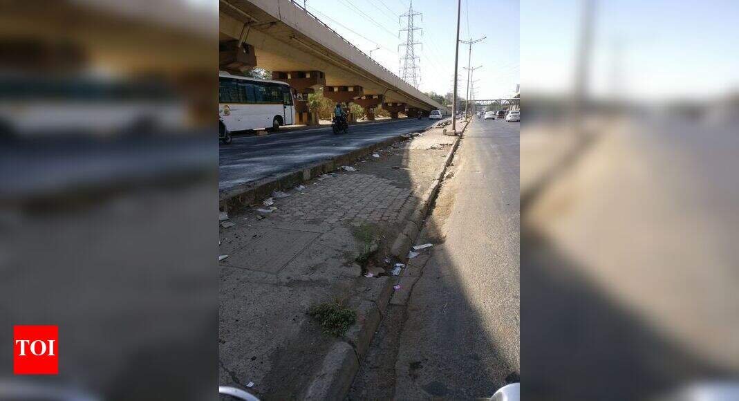 no proper footpath for people - Times of India