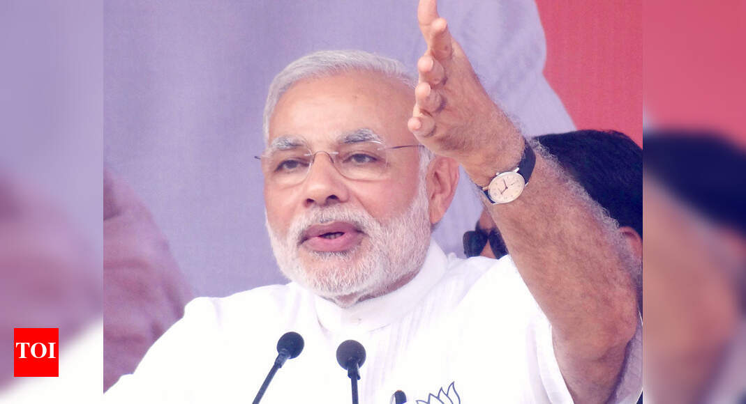 NaMo makes a brief stopover at Vadodara - Times of India
