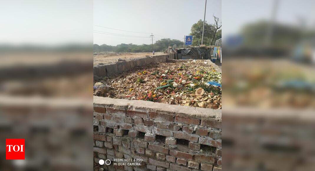 Compost pit overflowing - Times of India
