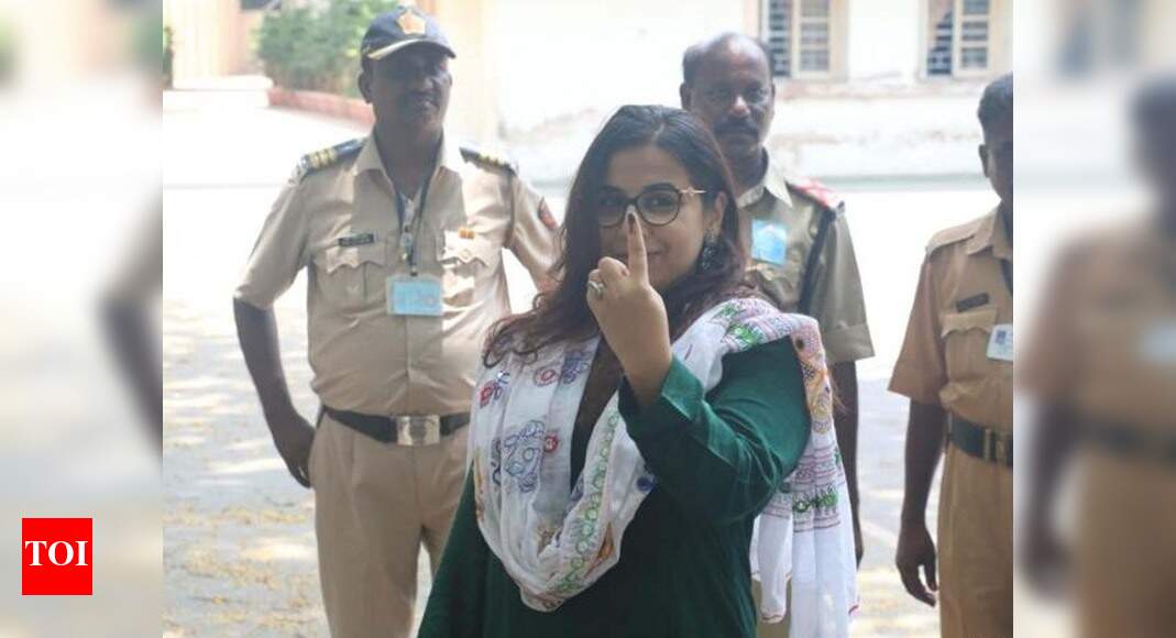 Pictures: Vidya Balan and family snapped at the polling booth in Mumbai ...