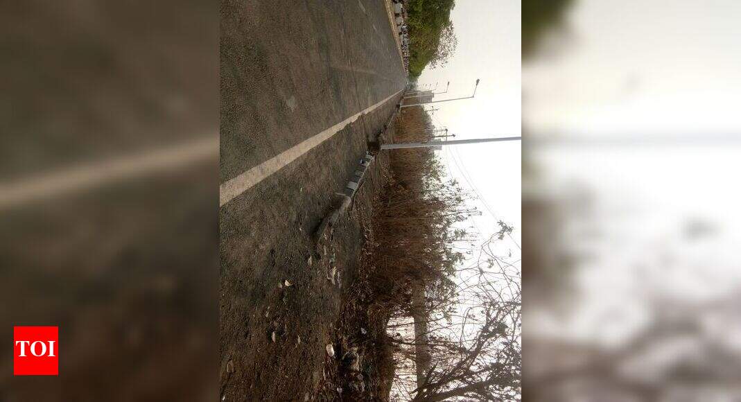 Undeveloped footpath for walking - Times of India