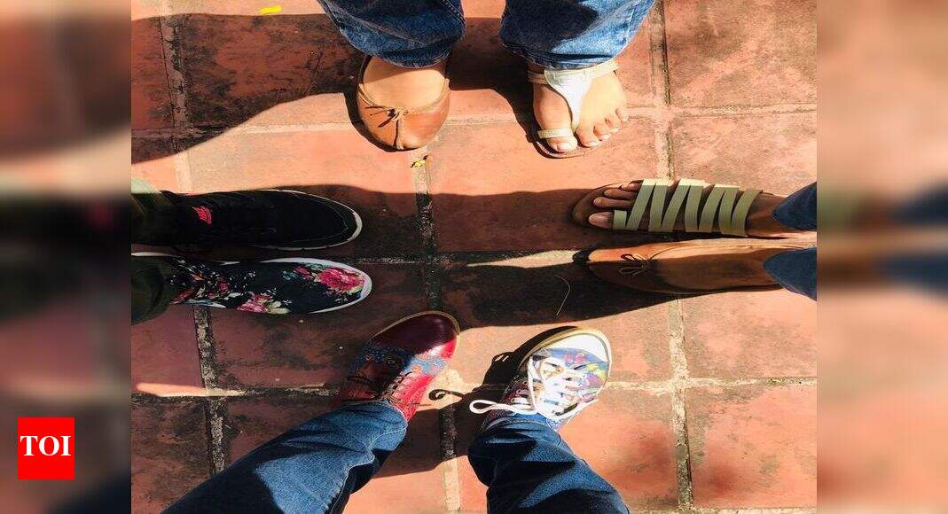 Celebrating differences with two coloured shoes - Times of India