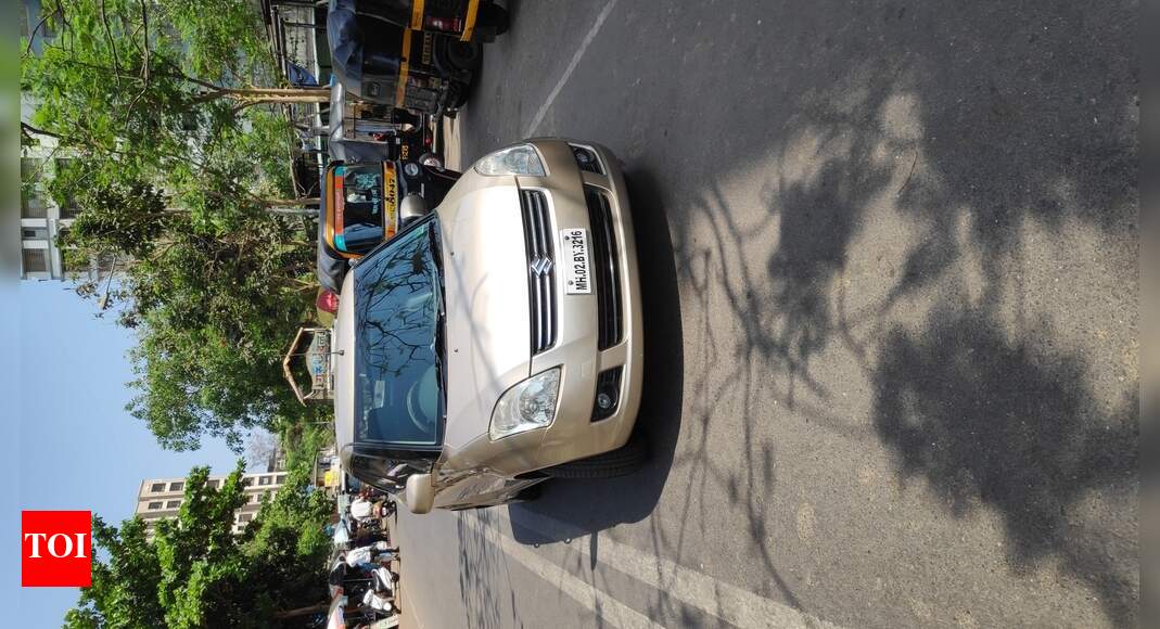 Parking in the middle of the road outside RTO off - Times of India