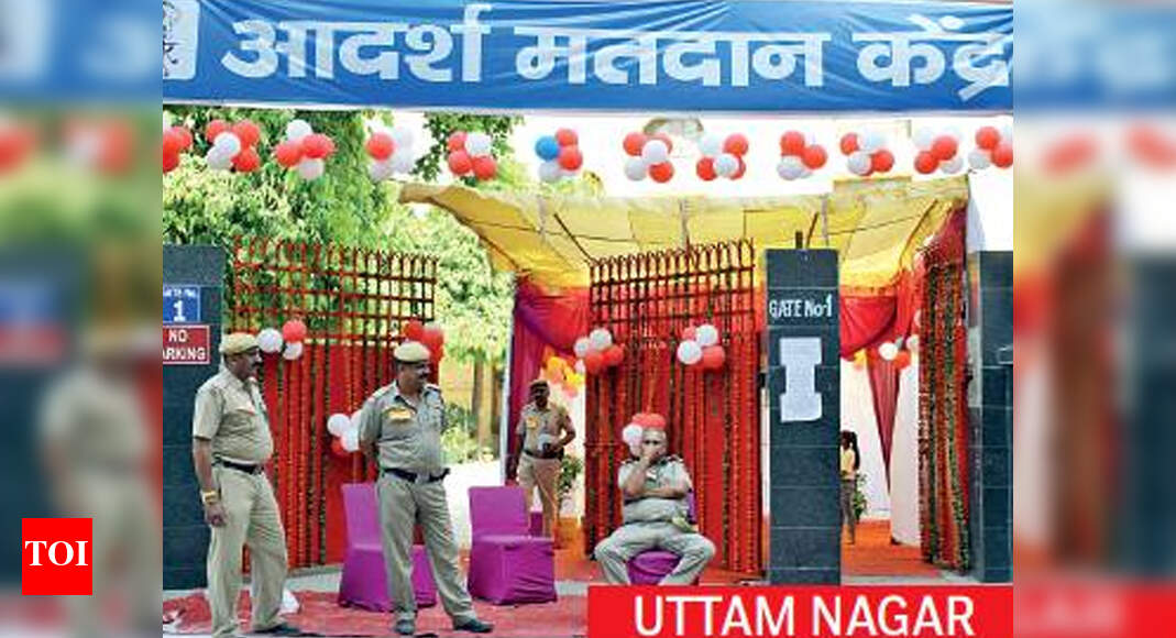 Model booths offer red carpet welcome to voters | Delhi News - Times of ...