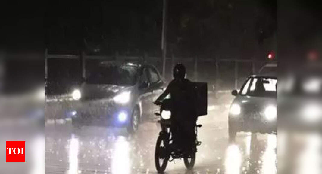 Rains bring relief from scorching heat, dust storm in parts of Delhi | Delhi News - Times of India