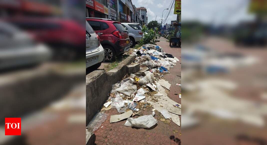 Footpath or dumping ground? - Times of India