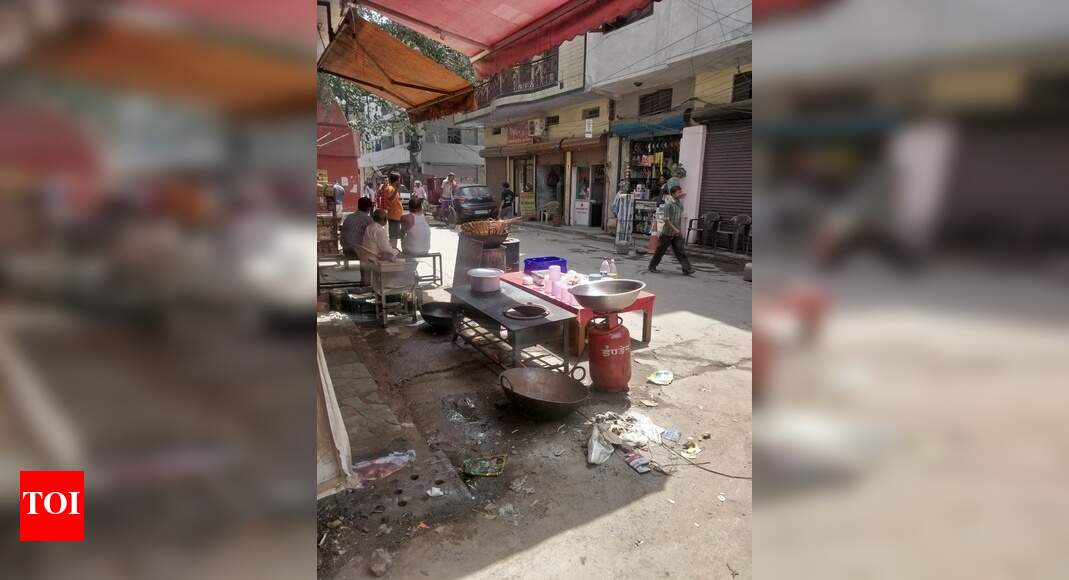 Encroachment of public space for commercial activity - Times of India