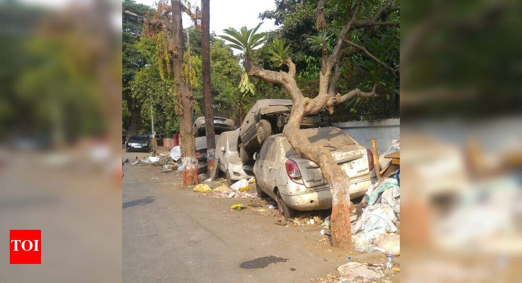 Khatara cars breeding garbage on footpath - Times of India