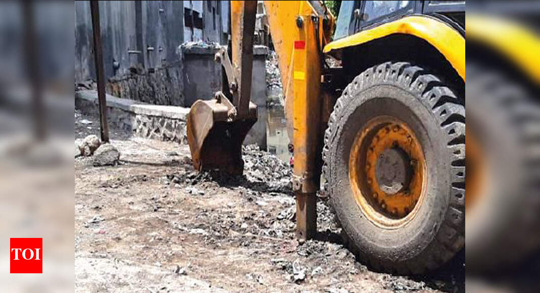 Machine brought for cleaning nullah breaks protection wall ...