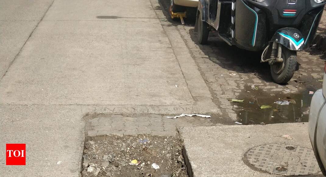 Shabby road work by BMC location SHIMPOLI road. - Times of India