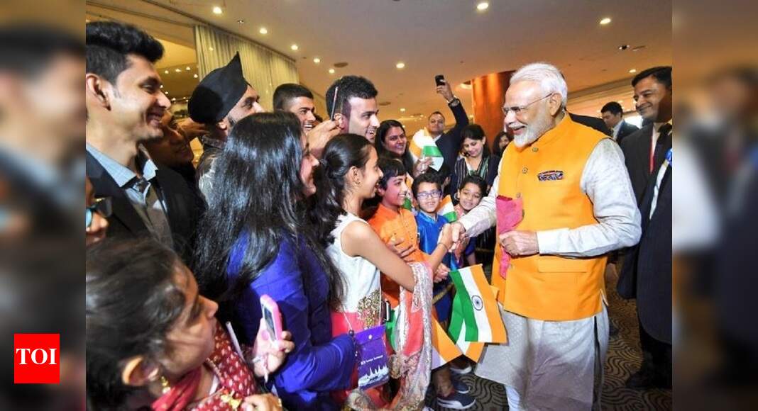 PM Modi accorded warm welcome by Indian community in Japan | India News - Times of India