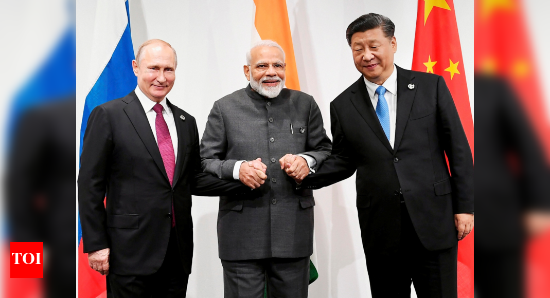 Modi, Xi and Putin also discuss climate | India News - Times of India