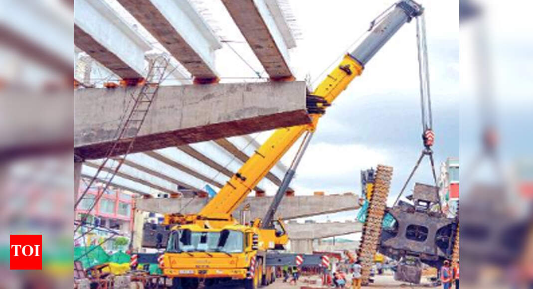Crane topples as road caves in, kills operator in Shaikpet | Hyderabad ...