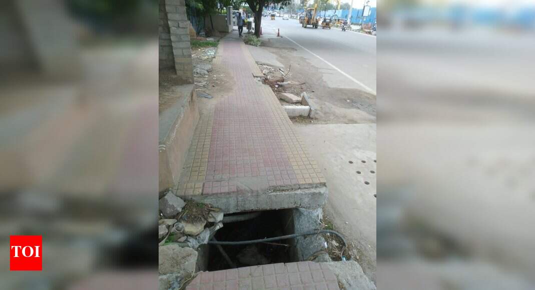 Dangerous break open of footpaths - Times of India