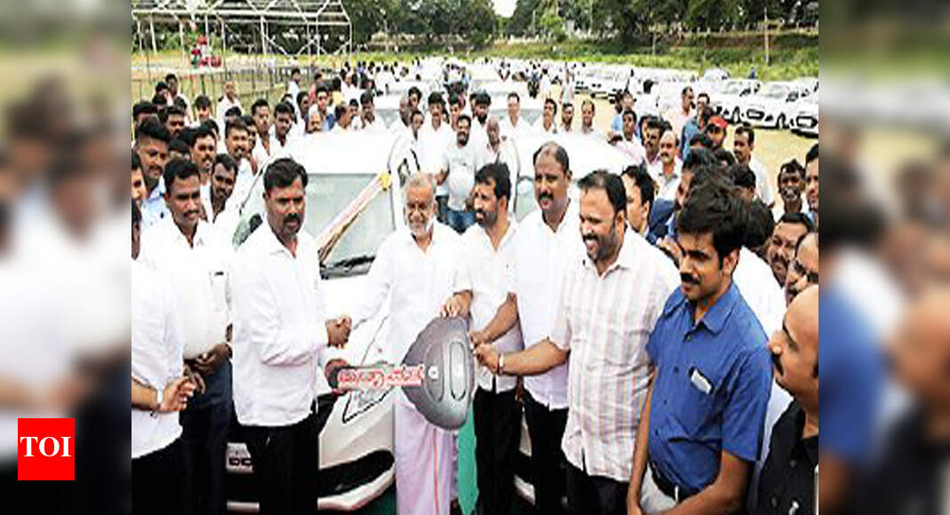 Cars given away to Dalit youngsters | Mysuru News - Times of India