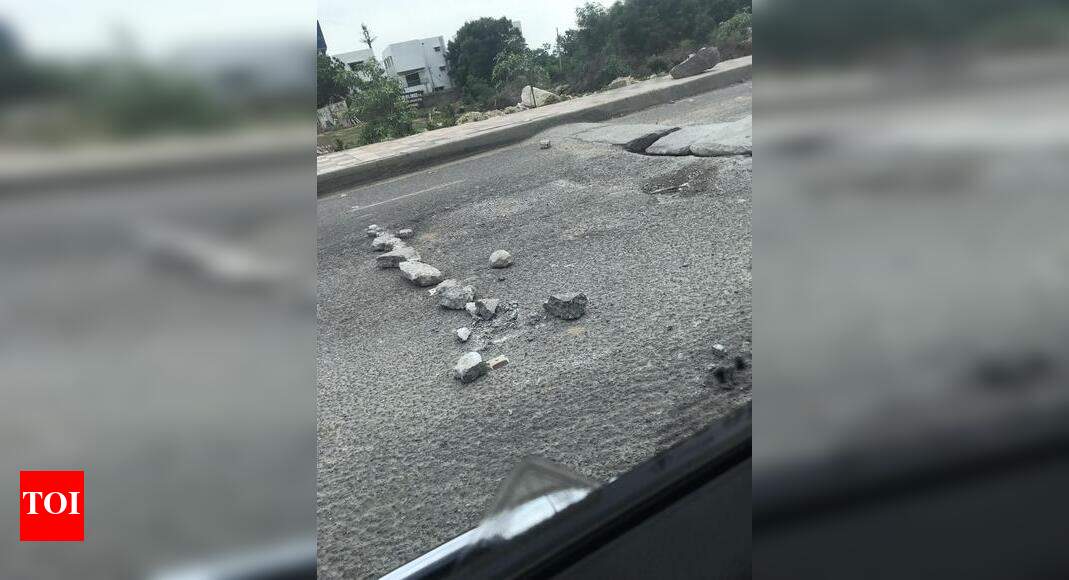 broken speed breakers and multiple potholes - Times of India