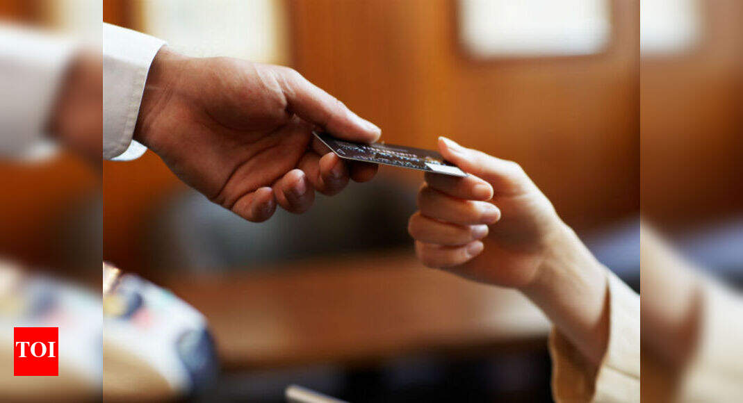 Debit cards drop sharply by 10 crore in March-May - Times of India