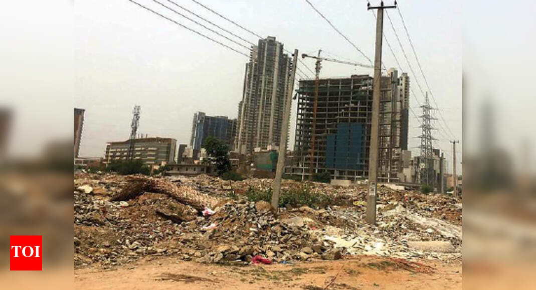 Gurugram: Trash piles up near upscale societies, residents fume | Gurgaon News - Times of India