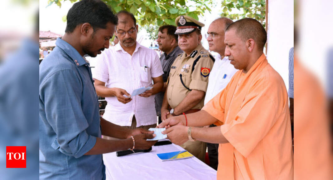 Will book land mafia under NSA: UP CM | India News - Times of India