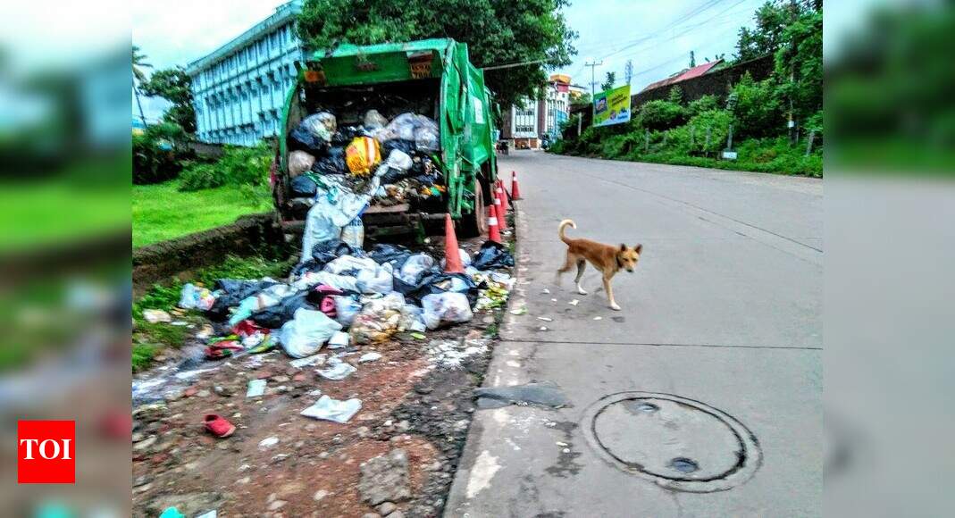 Garbage vehicle parking - Times of India