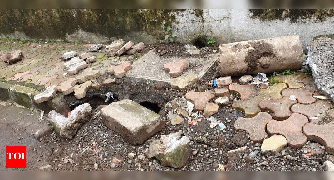 Bad Condition of Footpath - Times of India