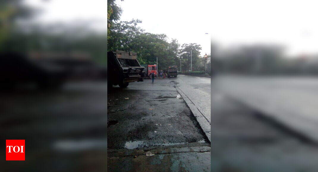 Parking BMC garbage trucks - Times of India