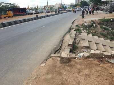 footpath completely damaged - Times of India