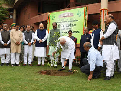 PM Modi participates in tree plantation drive | India News - Times of India