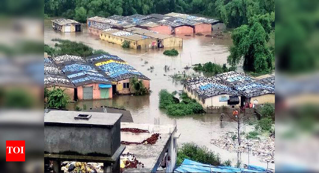 Many evacuated as water rises in Diva | Thane News - Times of India