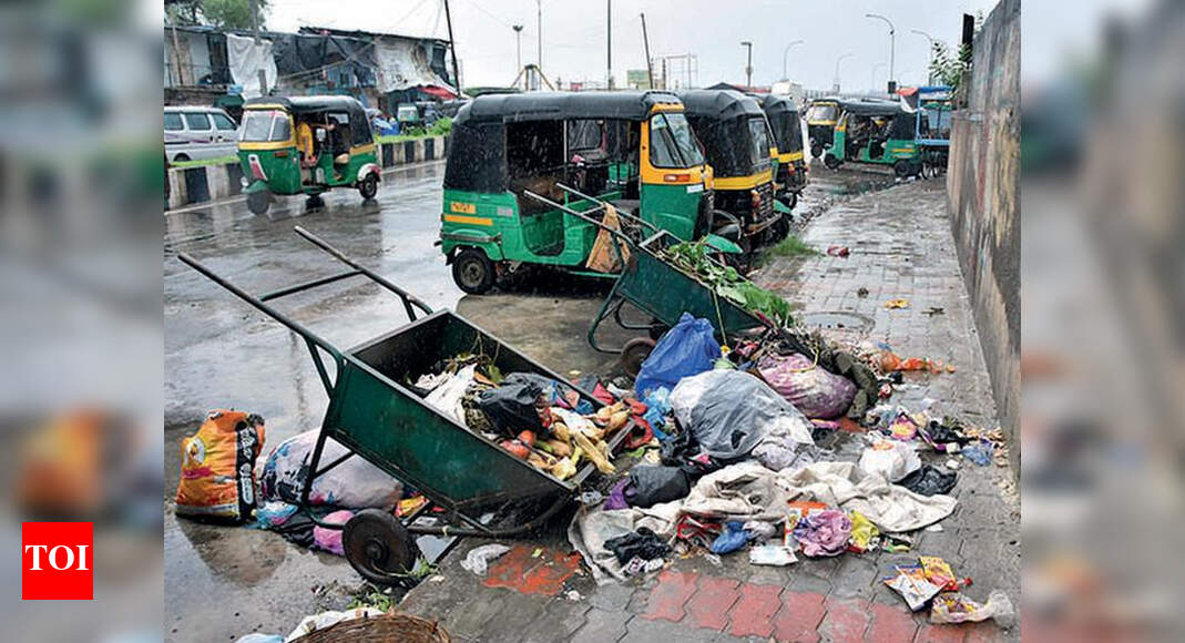 Surat: Overflowing bins raise a stink | Surat News - Times of India