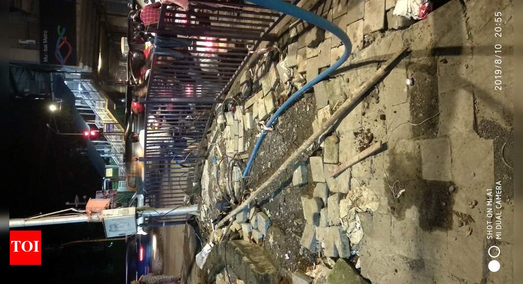 Footpath in bad condition - Times of India