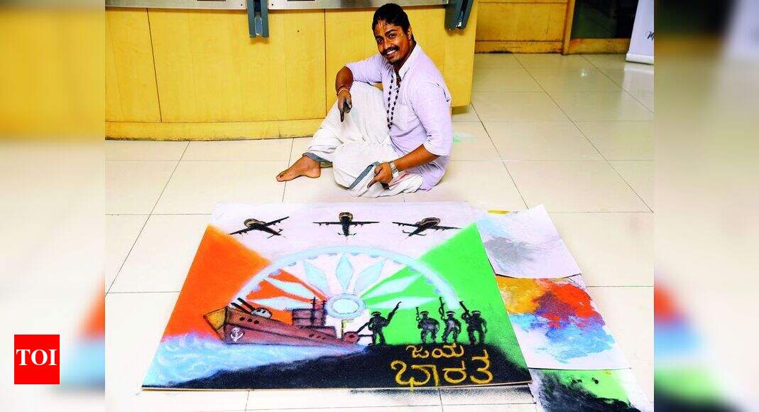 Meet the pujari who is on a mission to popularise rangoli - Times of India